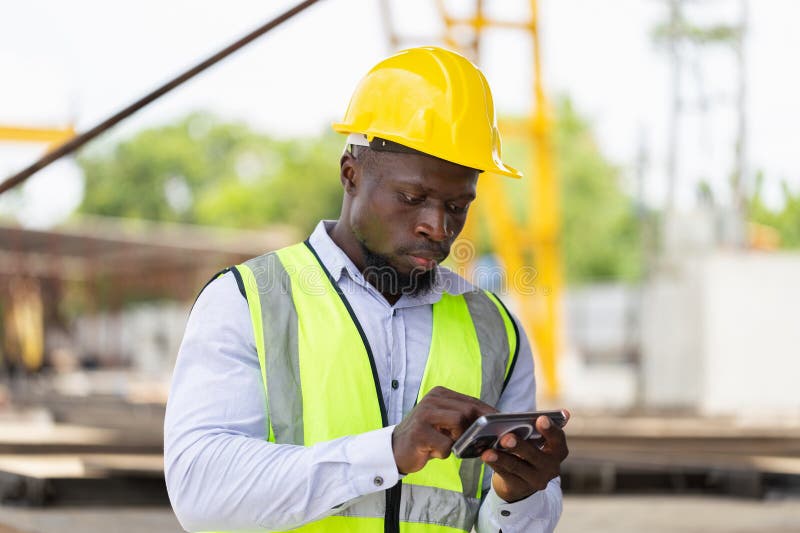 Engineer Man in Hardhats Using Mobile Smartphone on Construction Site ...