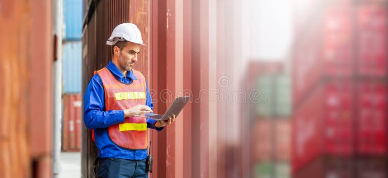 Engineer Man with Laptop Checking Containers Box in in Industry ...