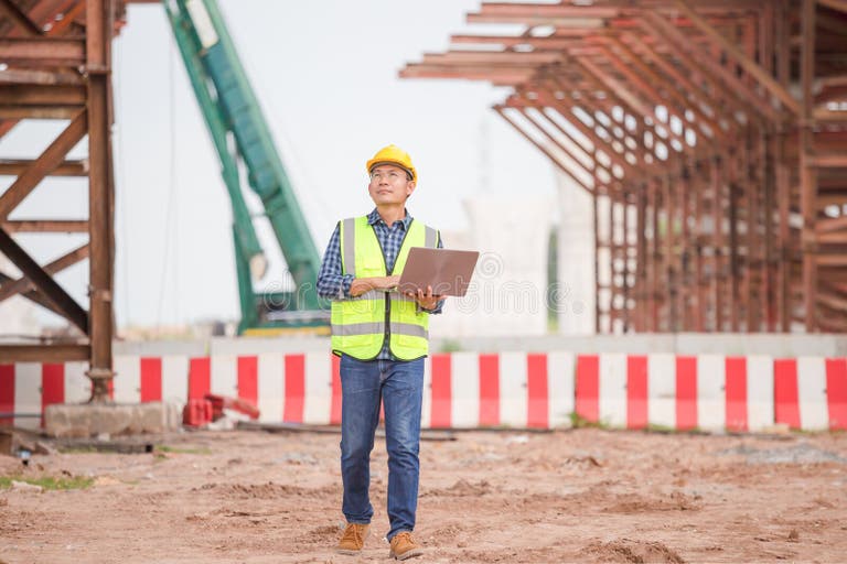 Engineer Man with Laptop at Construction Site, Foreman Worker Checking ...