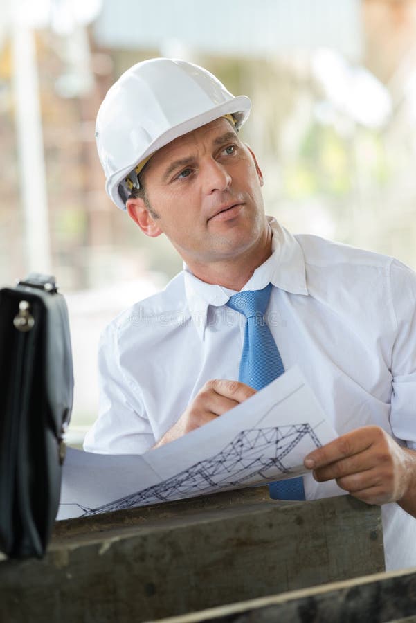 Engineer Man Looking at Drawings Stock Image - Image of office ...