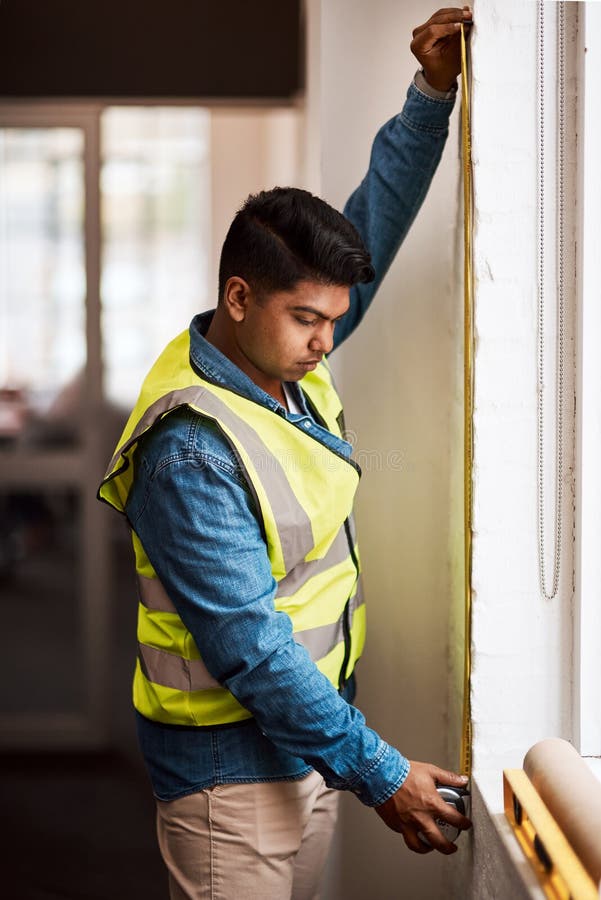 Engineer, Man and Measure Wall for Construction, Renovation and ...