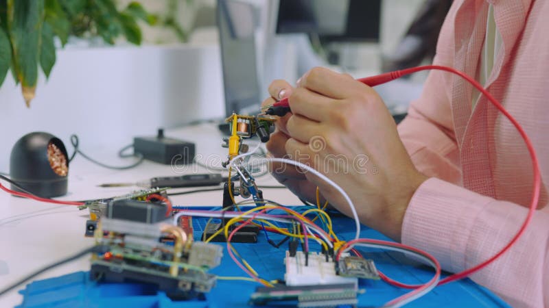 Engineer Man S Hand Measuring Electrical Voltage of Motherboard Using ...