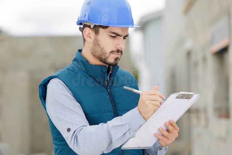 Engineer Man Taking Notes on Clipboard Stock Image - Image of notes ...