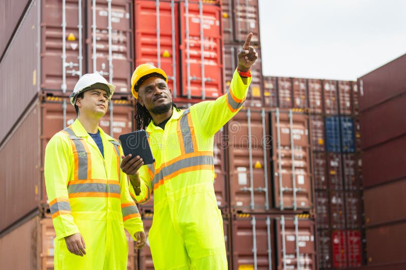 Engineer Man Team in Safety Gear Control Containers Box at Industrial ...