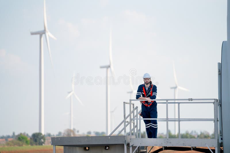Engineer Man or Technician Worker Stand on Base of Windmill or Wind ...