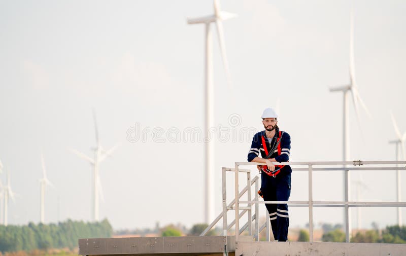 Engineer Man or Technician Worker Stand on Base of Windmill or Wind ...