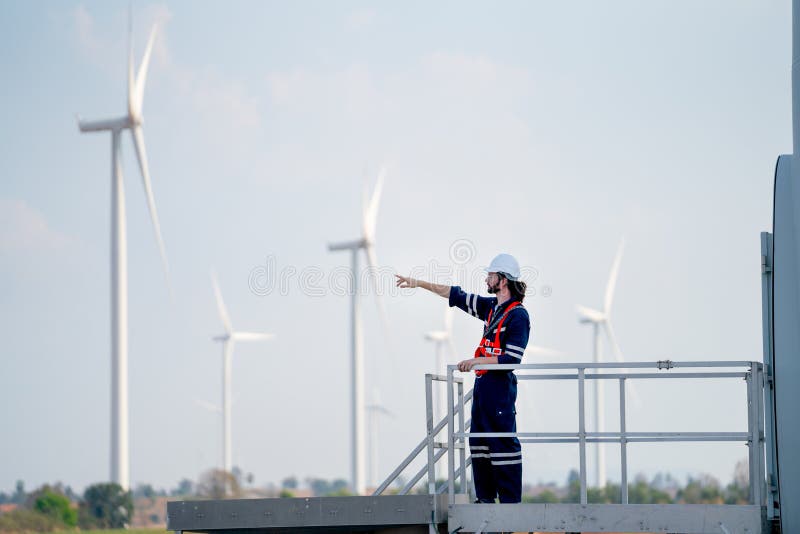 Engineer Man or Technician Worker Stand on Base of Windmill or Wind ...