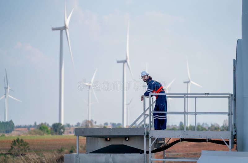 Engineer Man or Technician Worker Stand on Base of Windmill or Wind ...