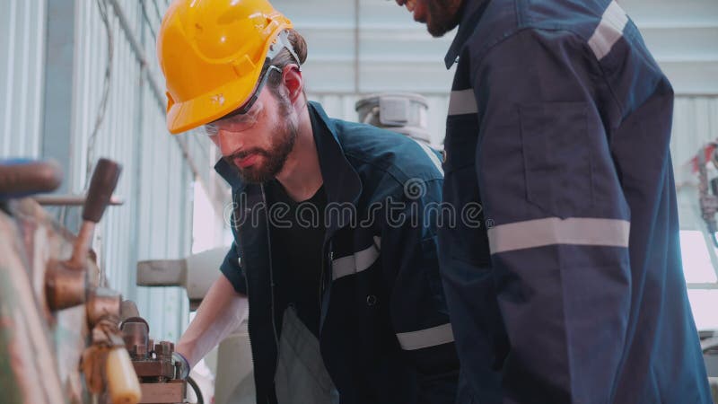 Engineer Man Training with Foreman for Apprentice Using Lathe ...