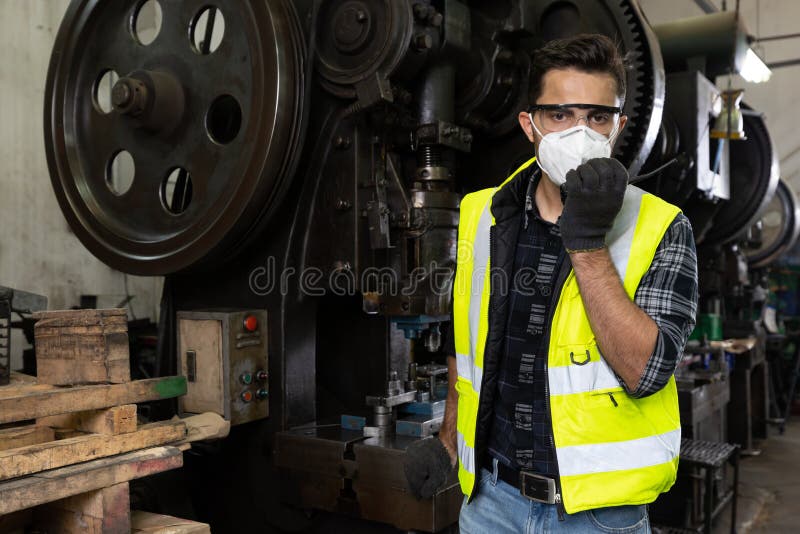 Engineer Man Wearing Face Mask and and Using Walkie-talkie while ...