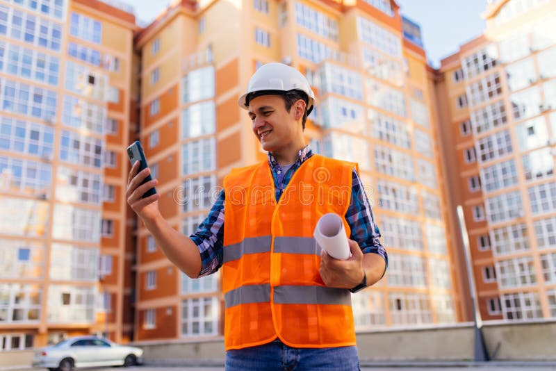 Engineer Man with Win Gesture on Building Site Stock Image - Image of ...