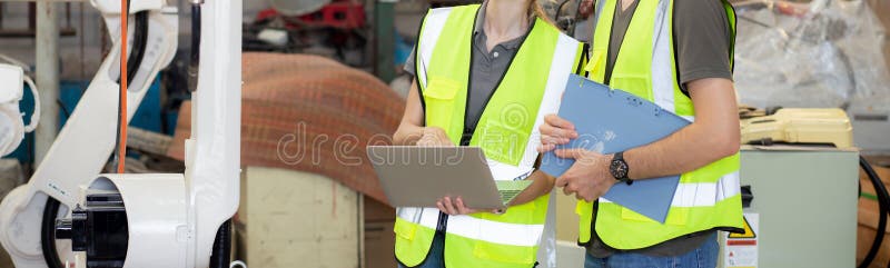 Engineer Man and Woman Talking and Explaining about Robot Arms ...