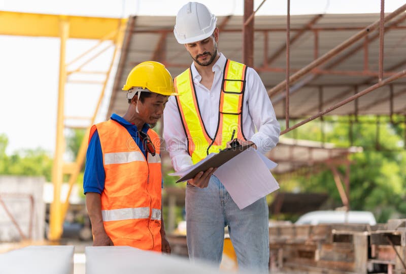 Engineer Man and Worker Team Inspect the Construction Site, Site ...