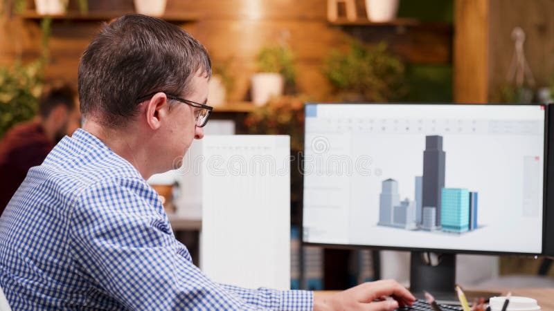Engineer Man Working at Architectural Building Prototype on Computer ...
