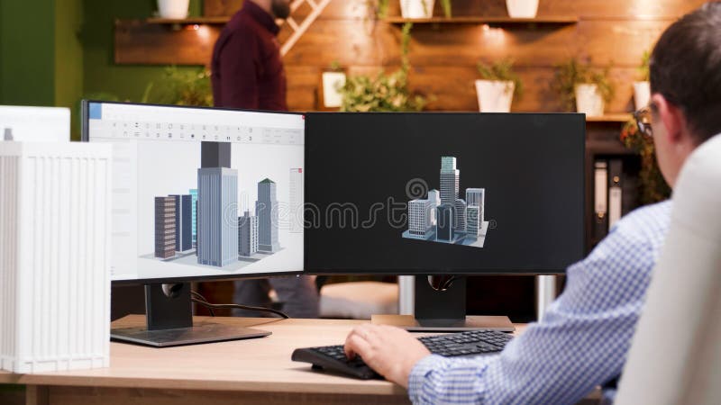 Engineer Man Working at Architectural Building Prototype on Computer ...