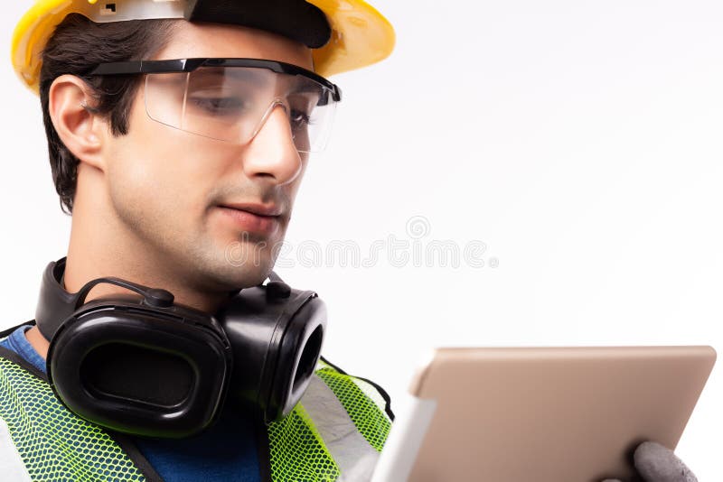 Engineer Man Working on Digital Tablet Computer at Worksite or Industry ...