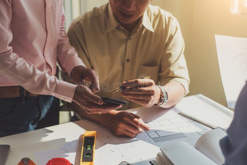 Engineer Man Working with Drawings Inspection in Workplace in Office ...
