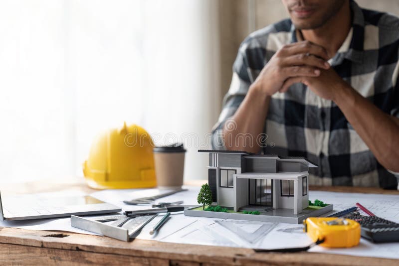 Engineer Man Working with Laptop and Inspection for Architectural Plan ...