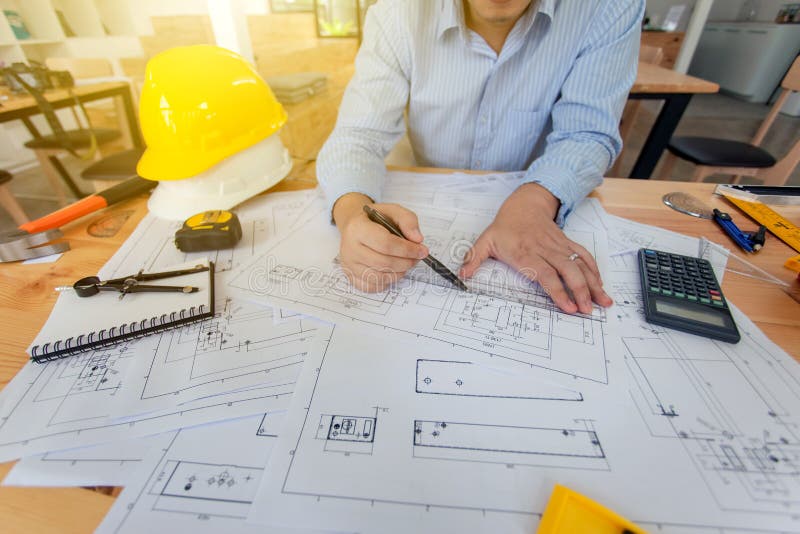 Engineer Man Working in the Office, Drawing and Planning the ...