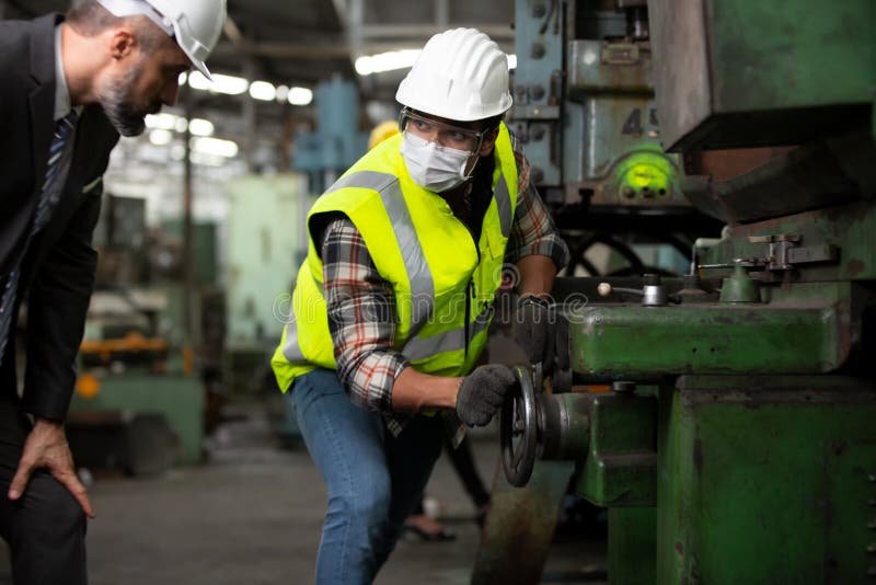 Manager on factory floor stock photo. Image of environment - 14219536