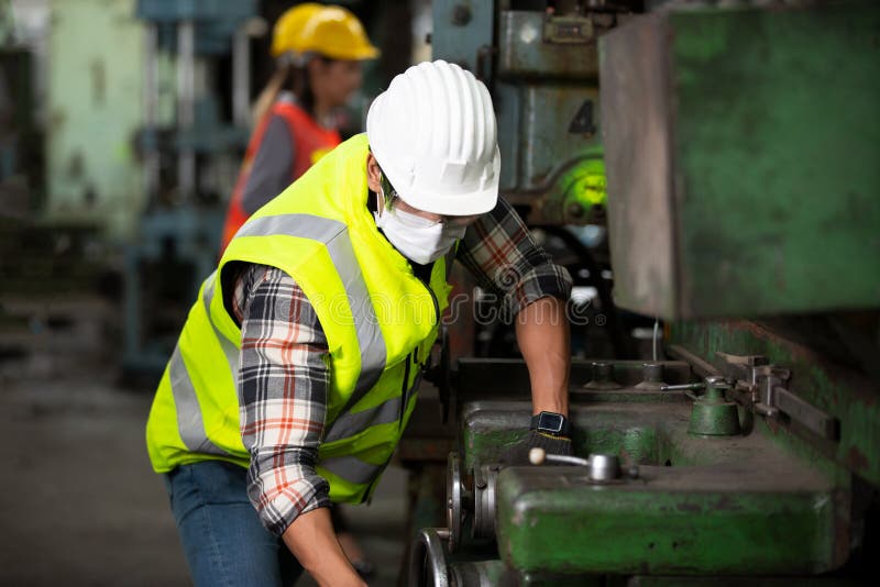 Manager on factory floor stock photo. Image of environment - 14219536
