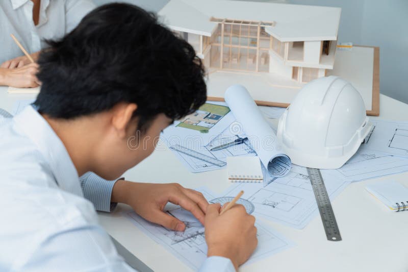 Engineer Measures Model while Skilled Designer Taking a Note ...