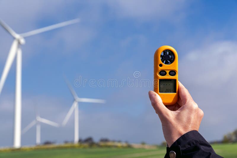 Engineer Measuring Wind Speed for Renewable Energy with Anemometer and ...