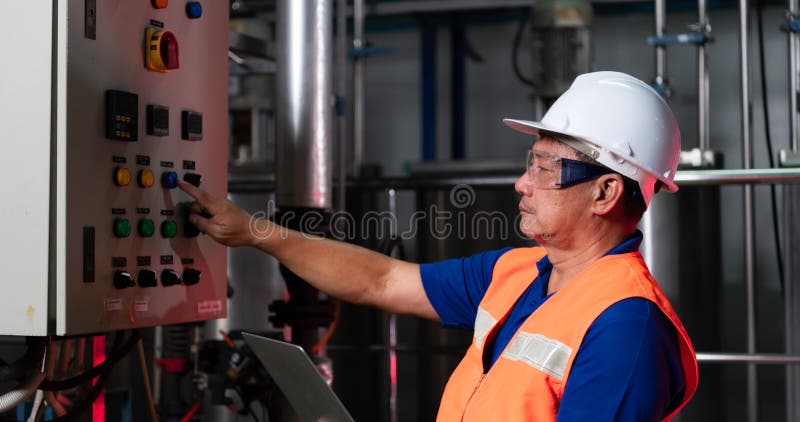 Engineer of Mechanical Plant Checking the Electronic Circuit of the ...