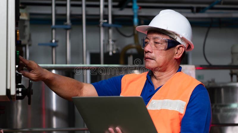 Engineer of Mechanical Plant Checking the Electronic Circuit of the ...