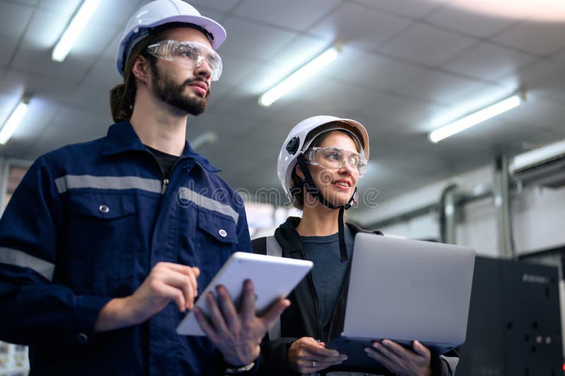Engineer Mechanician Operating and Controlling CNC Machine Stock Image ...