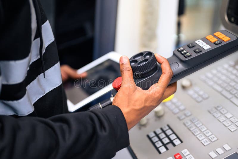 Engineer Mechanician Operating and Controlling CNC Machine Stock Image ...