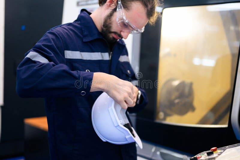 Engineer Mechanician Operating and Controlling CNC Machine Stock Image ...