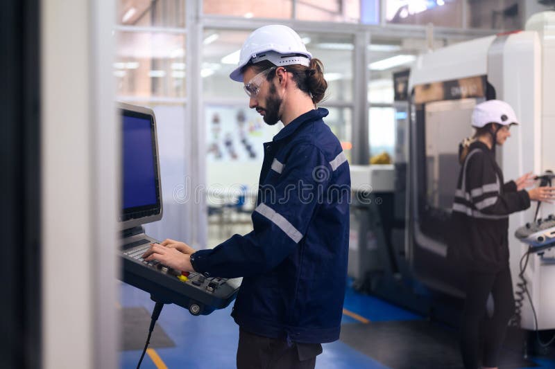 Engineer Mechanician Operating and Controlling CNC Machine Stock Image ...