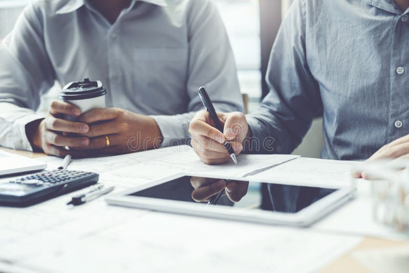 Engineer Meeting and Using Digital Tablet for Architectural Project and ...