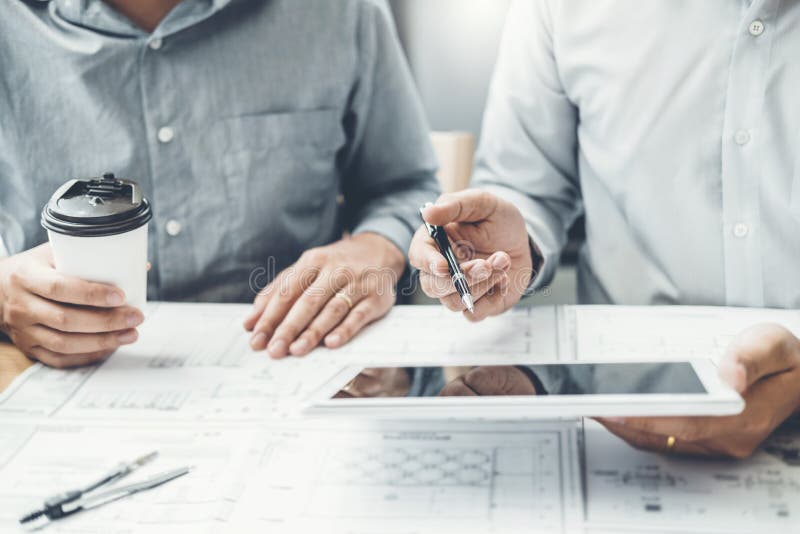 Engineer Meeting and Using Digital Tablet for Architectural Project and ...