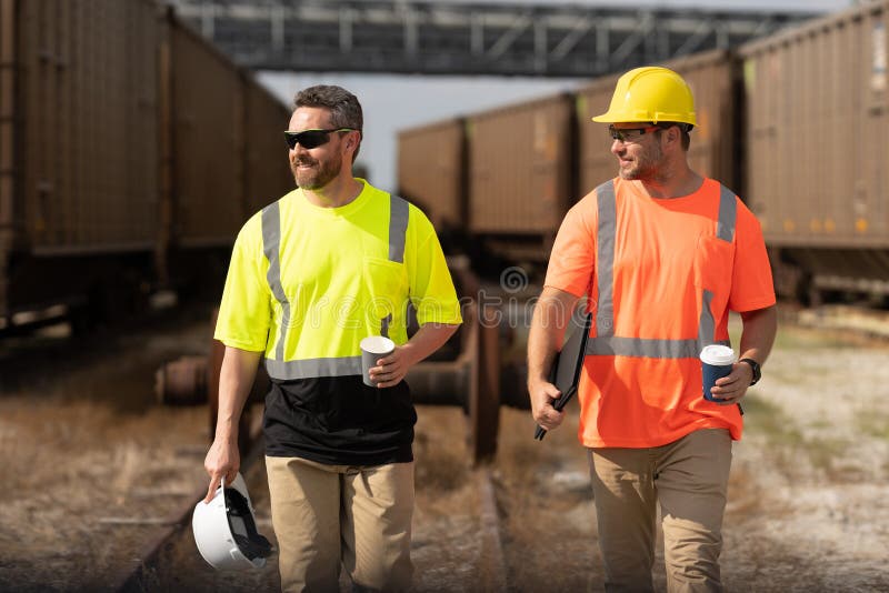 Engineer Men at Construction Site Having Coffee Break. Engineer Men at ...