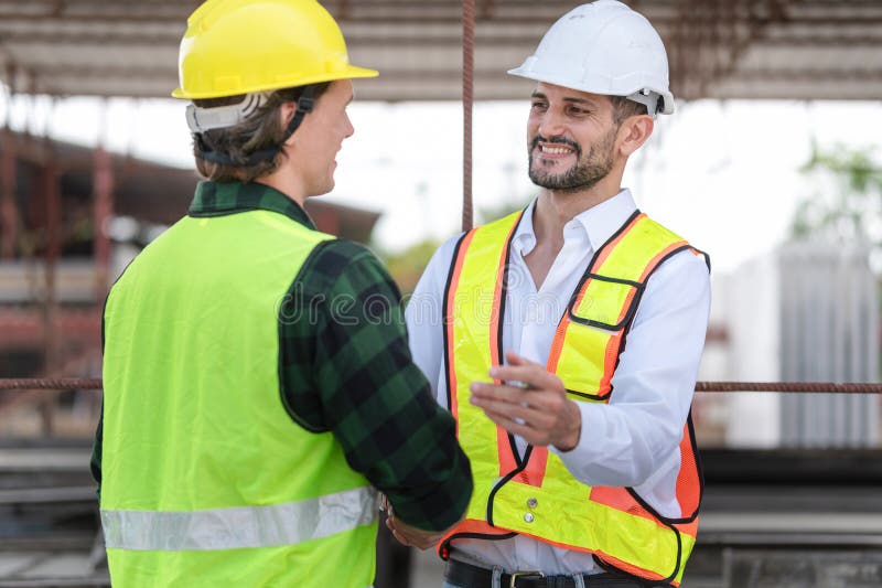 Engineer Man in Hardhat Team Working at Construction Site, Foreman ...
