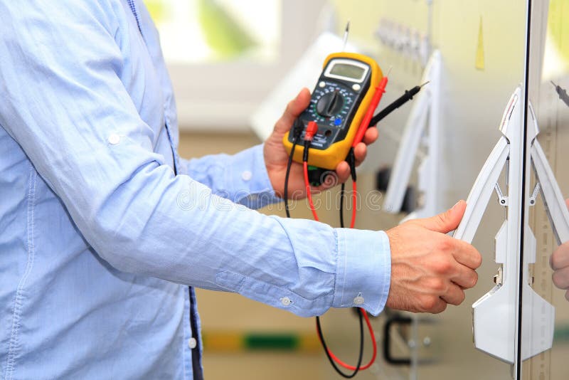 The Engineer Use Multimeter To Repairing the Computer Motherboard Stock ...
