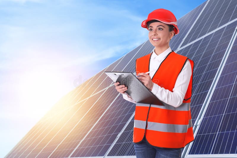 Engineer Near Solar Panels Outdoors. Alternative Energy Source Stock ...