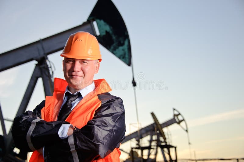 Engineer in an Oil field stock image. Image of inspector - 21478113