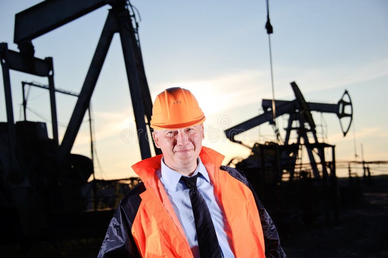 Engineer in an Oil field stock photo. Image of business - 21476144