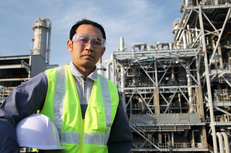 Engineer oil refinery stock image. Image of hard, factory - 24405437