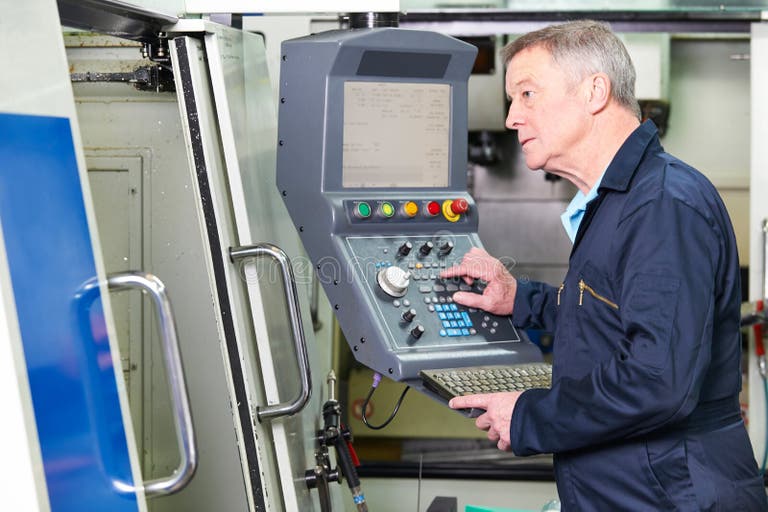 Engineer Operating Computer Controlled Cutting Machine Stock Photo ...