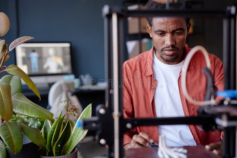 Engineer Operating 3D Printer in Office Setting Stock Photo - Image of ...