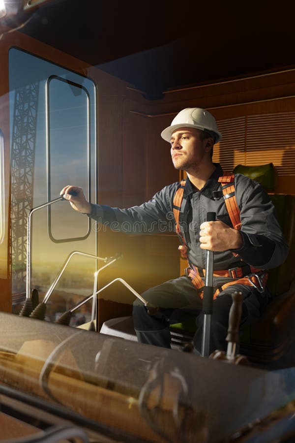 Engineer Operator Crane in Action . he Sit a Top in Crane Cabin and ...