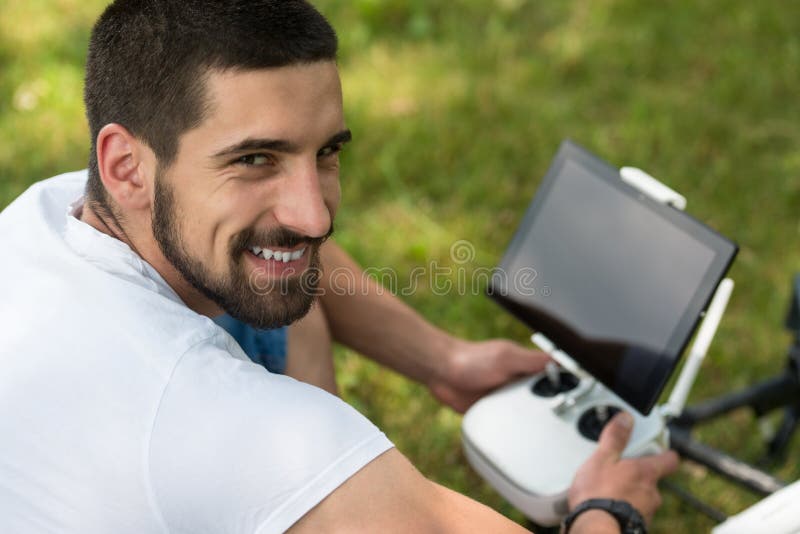 Engineer Outdoors with Remote Control Preparing the Drone Stock Photo ...