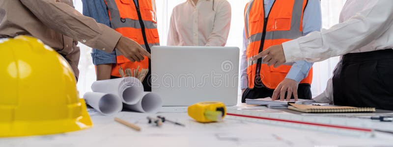 Engineer Partner Drawing and Working on Blueprint Design Together ...