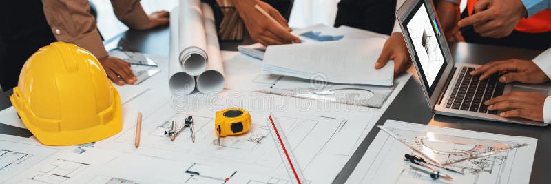 Engineer Partner Drawing and Working on Blueprint Design Together ...