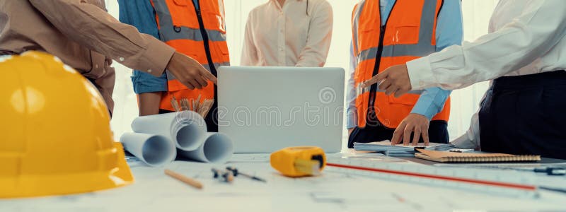 Engineer Partner Drawing and Working on Blueprint Design Together ...