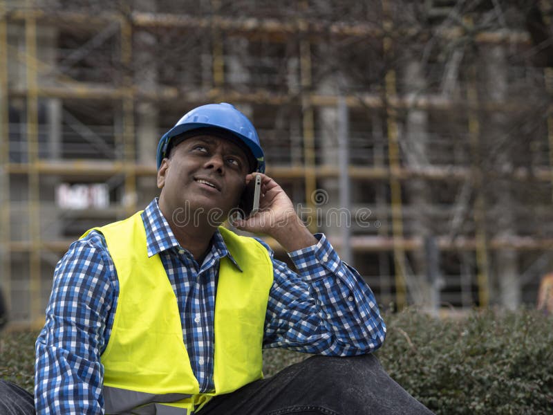 Engineer on phone stock photo. Image of male, people - 243878872
